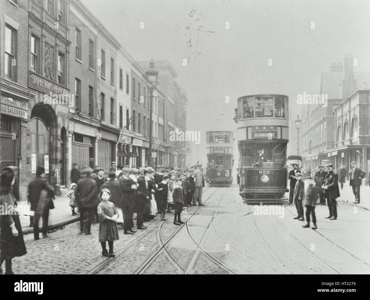 Pedestrians and trams in Commercial Street, Stepney, London, 1907 ...
