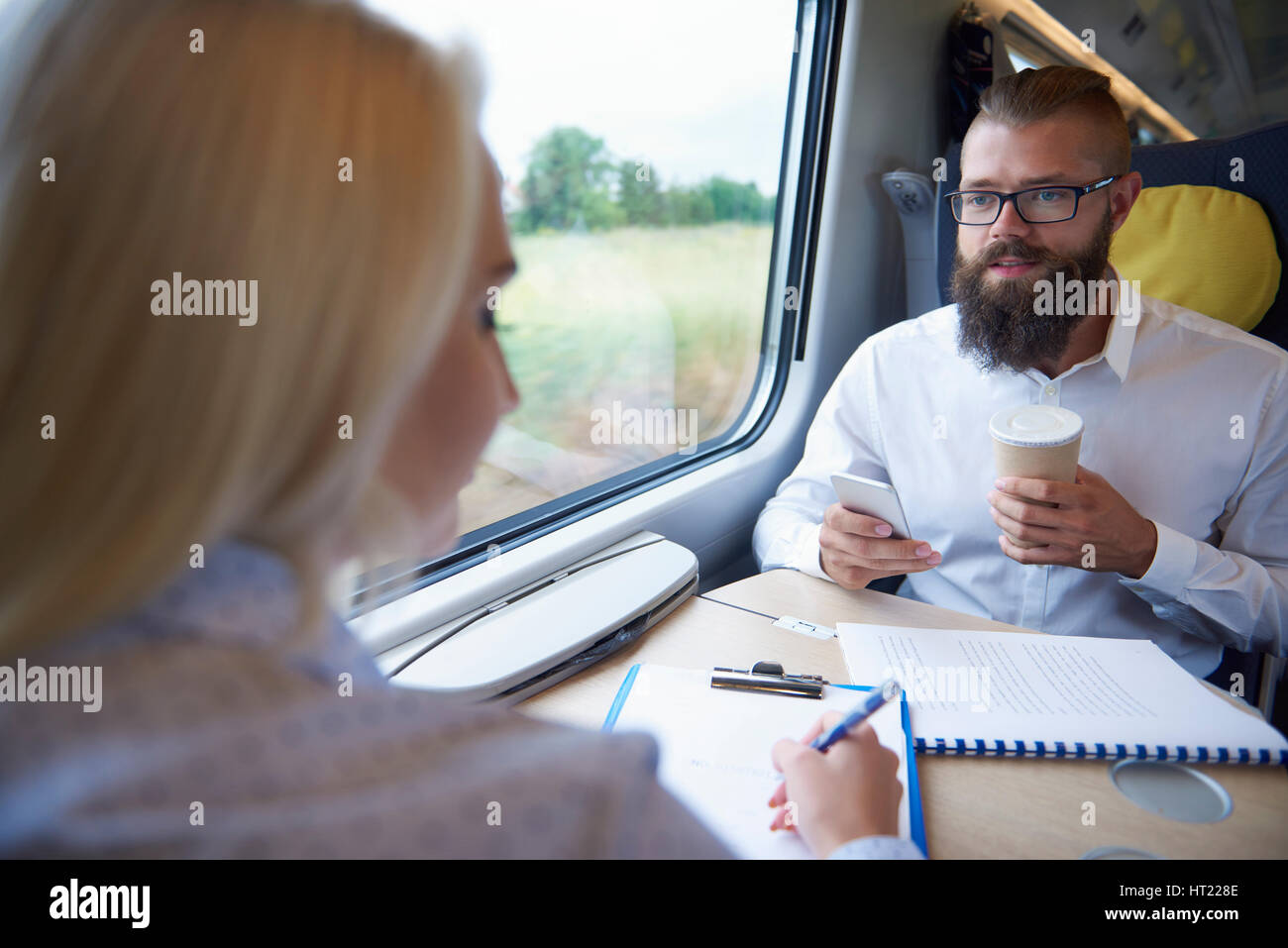 Business team in the train Stock Photo - Alamy