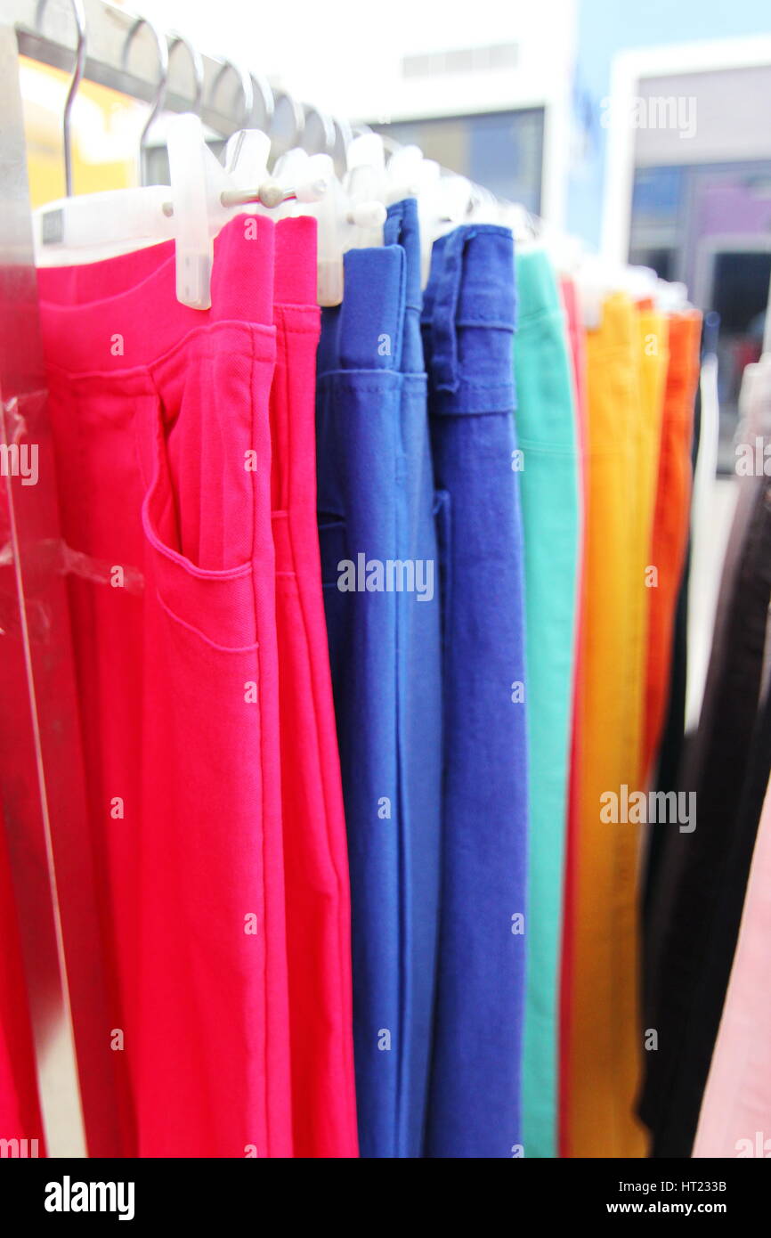 Closed Up Hanging Colorful Trousers Stock Photo - Alamy