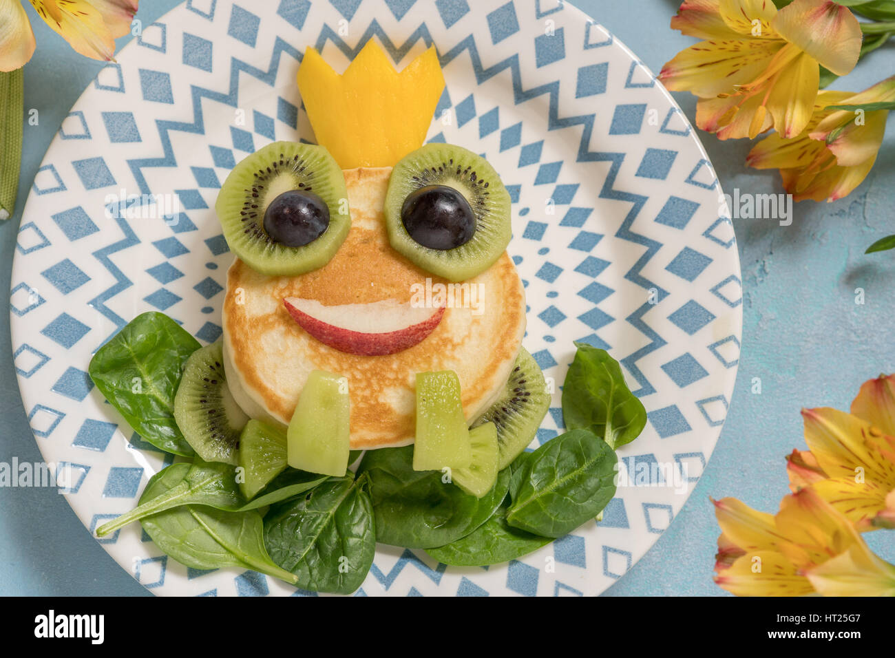 Breakfast for kids - frog prince pancake with fruits Stock Photo - Alamy