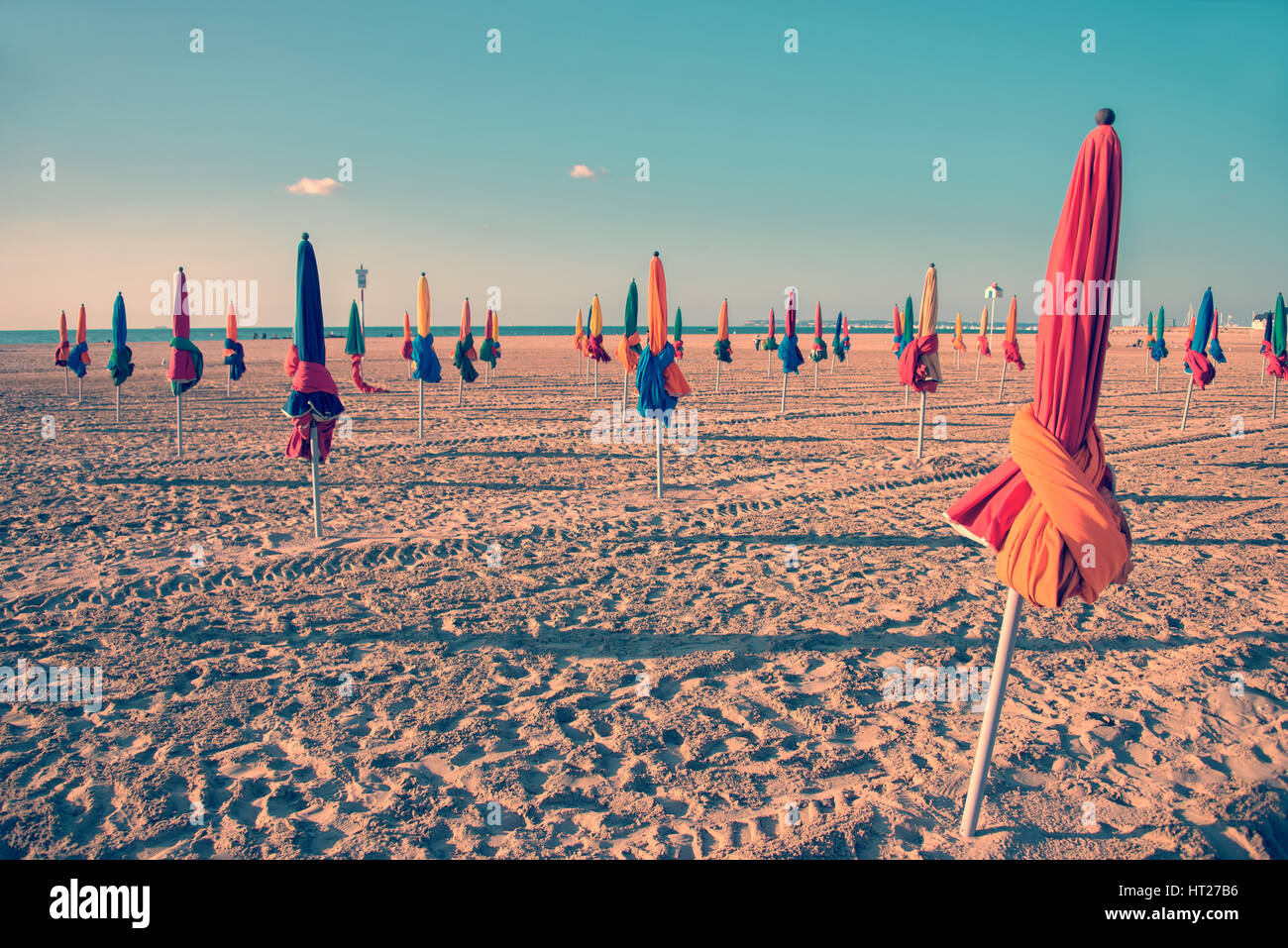 Colorful parasols on Deauville beach, France, vintage process Stock ...