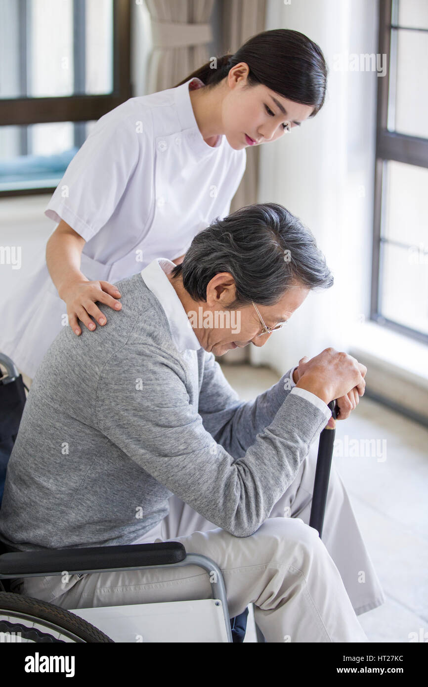 Care home assistant worried hi-res stock photography and images - Alamy