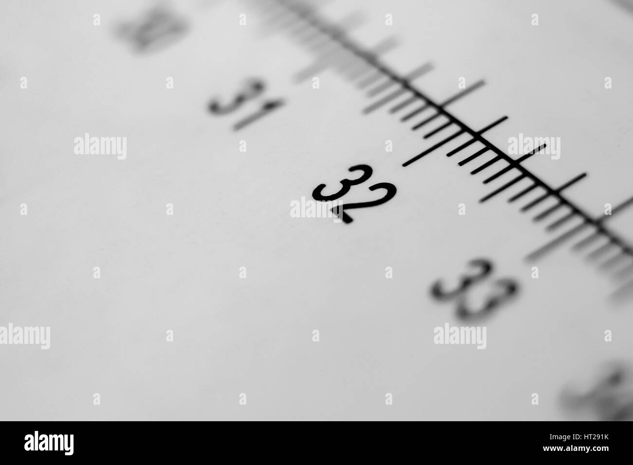 Scale number thirty-two on ruler Stock Photo - Alamy
