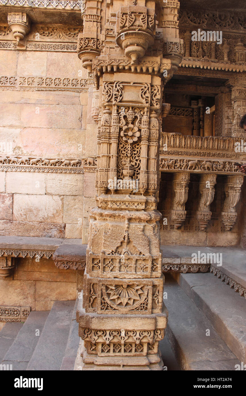 Stone carving on a pillar, pilaster. Adalaj Stepwell, Ahmedabad ...