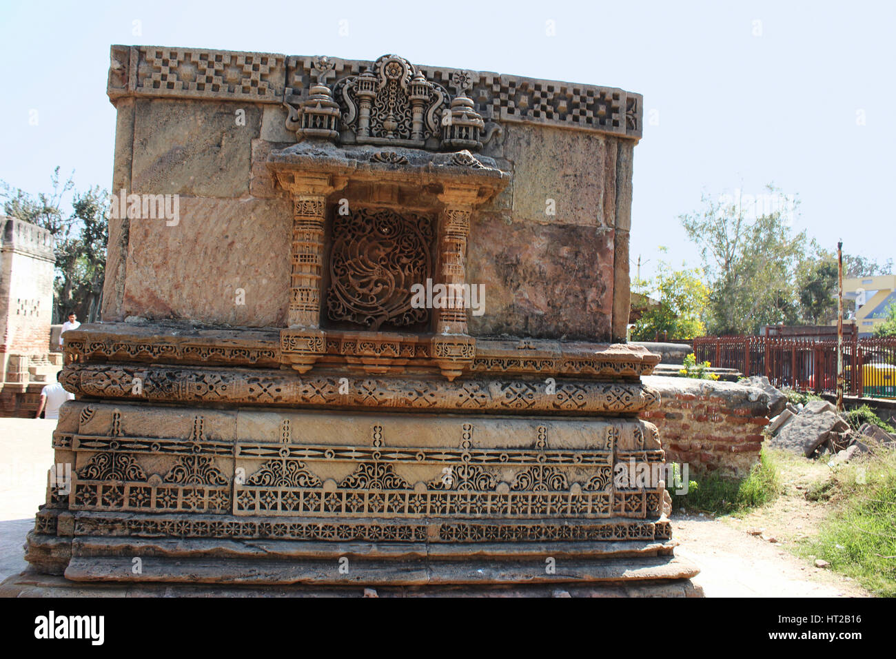Intricate patterns engraved on a stone at West entrance. Adalaj step ...