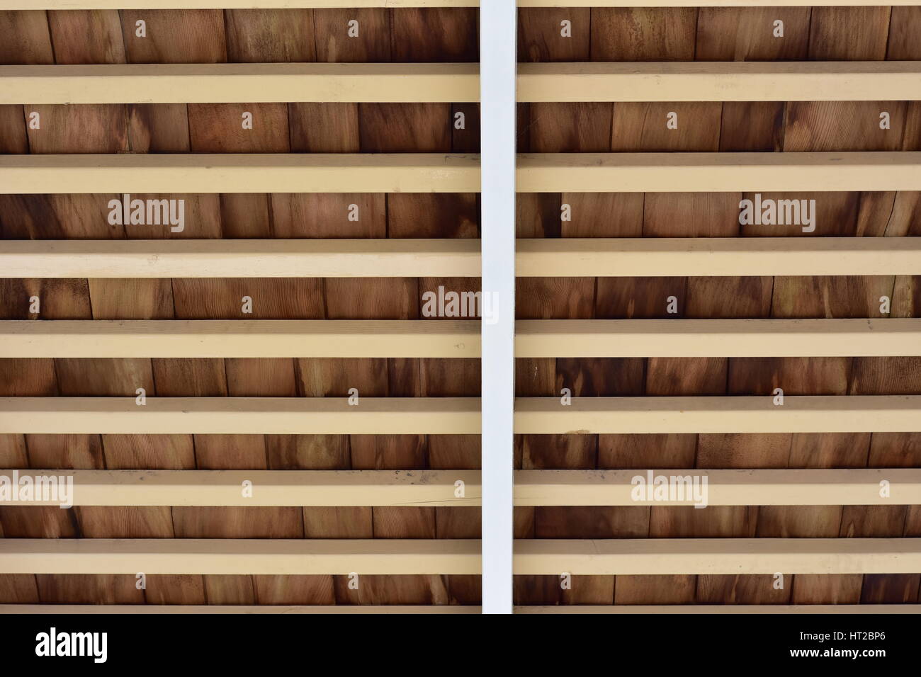 Rustic wooden ceiling showing horizontal beams and rows of wooden ...