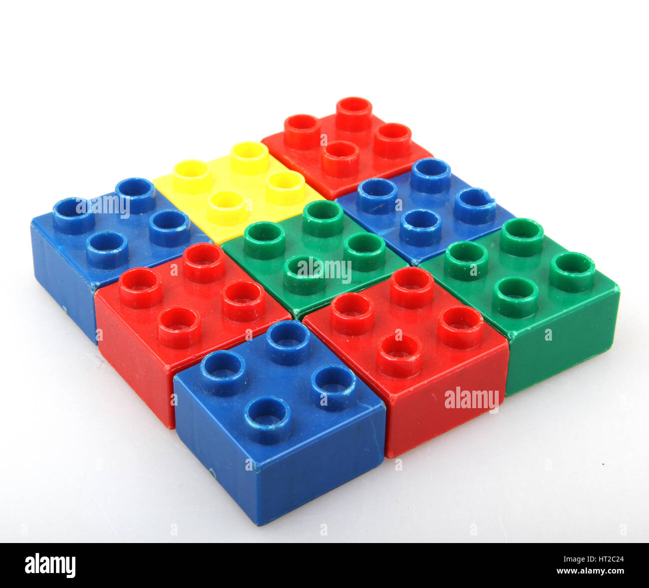 Plastic building blocks isolated on white background Stock Photo - Alamy