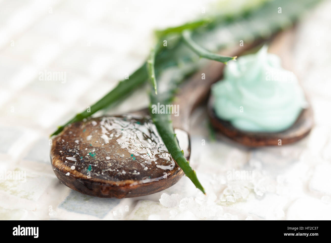 Aromatherapy spa background with aloe, sea salt, essential oil and ...