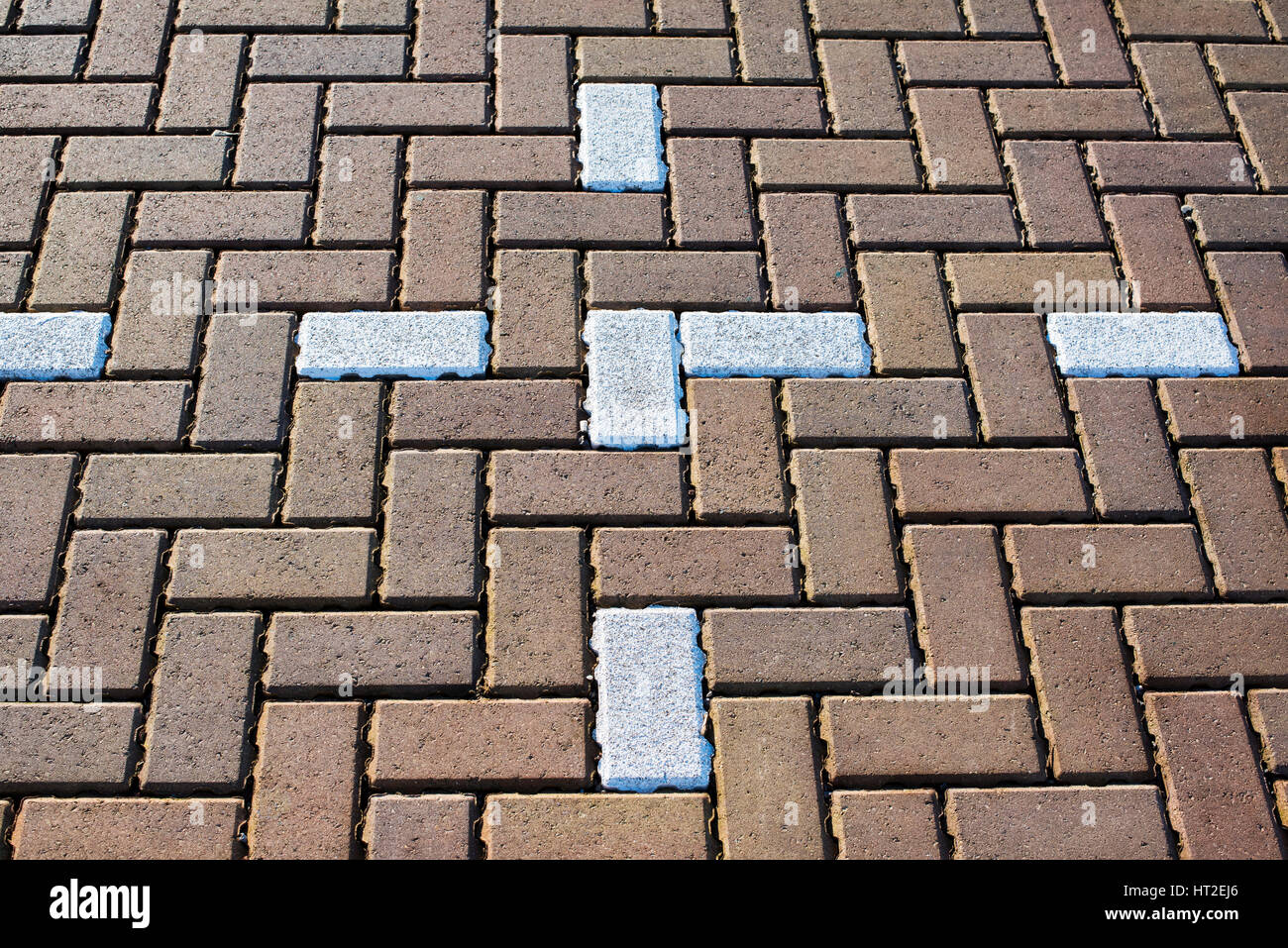 Abstract herringbone block paving in a car park pattern Stock Photo - Alamy