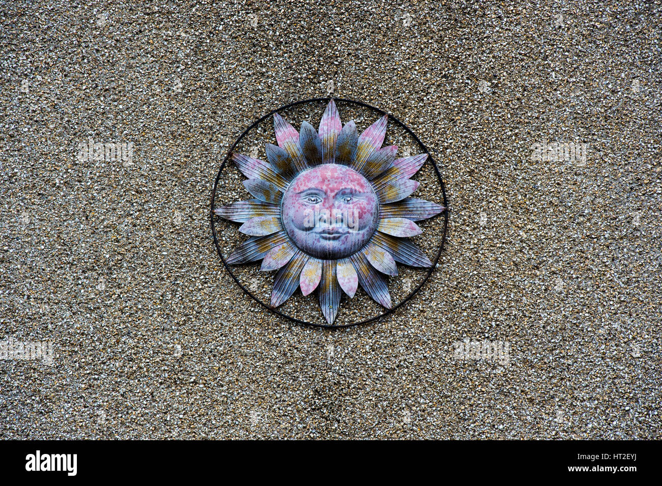 Sun symbol on a house wall. Scotland Stock Photo - Alamy