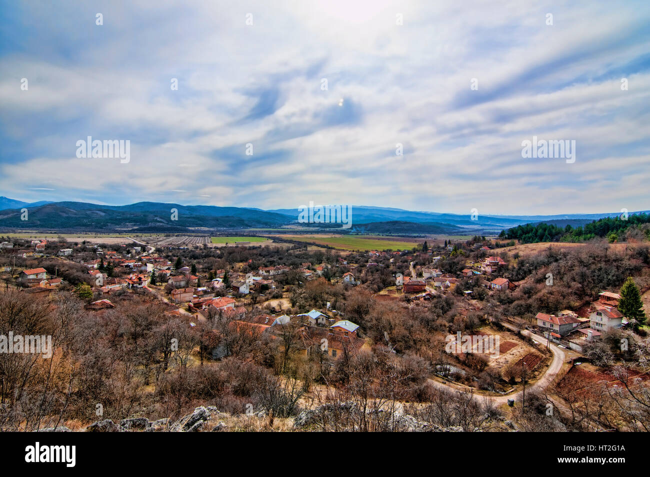 over the village Stock Photo - Alamy