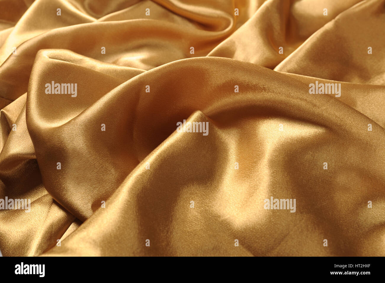 Wavy folds of grunge silk texture satin velvet material or luxurious ...