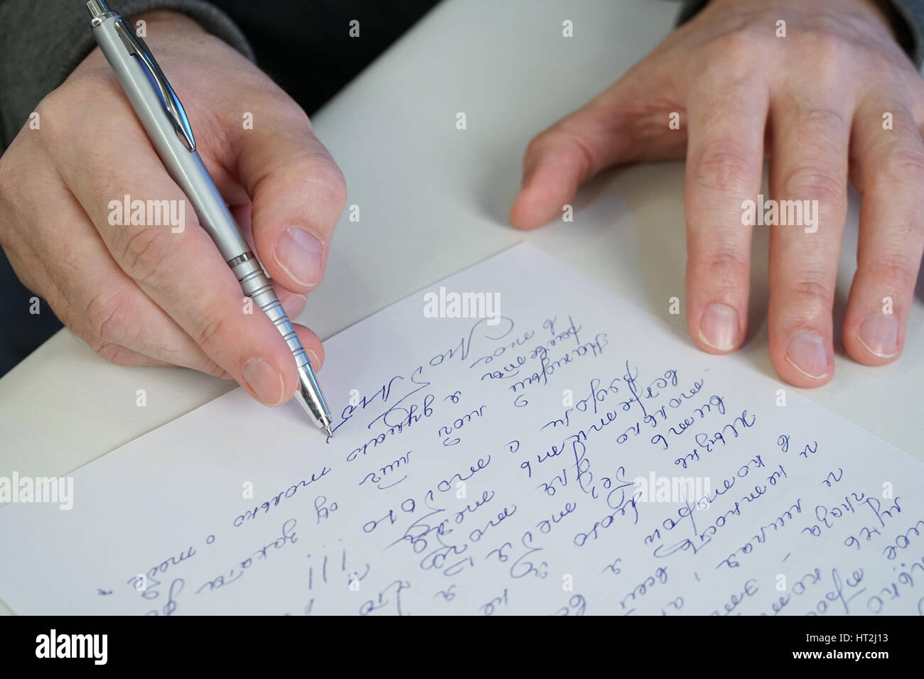 Man write letter at the desk Stock Photo - Alamy