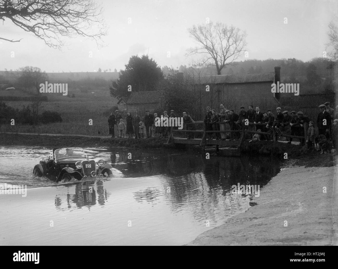 Car driving through a ford Black and White Stock Photos & Images - Alamy