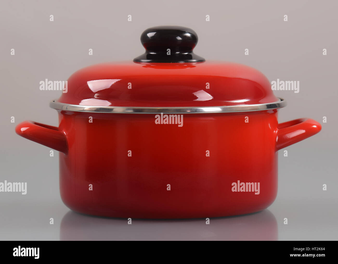 Enameled pan with handle and lid Stock Photo - Alamy
