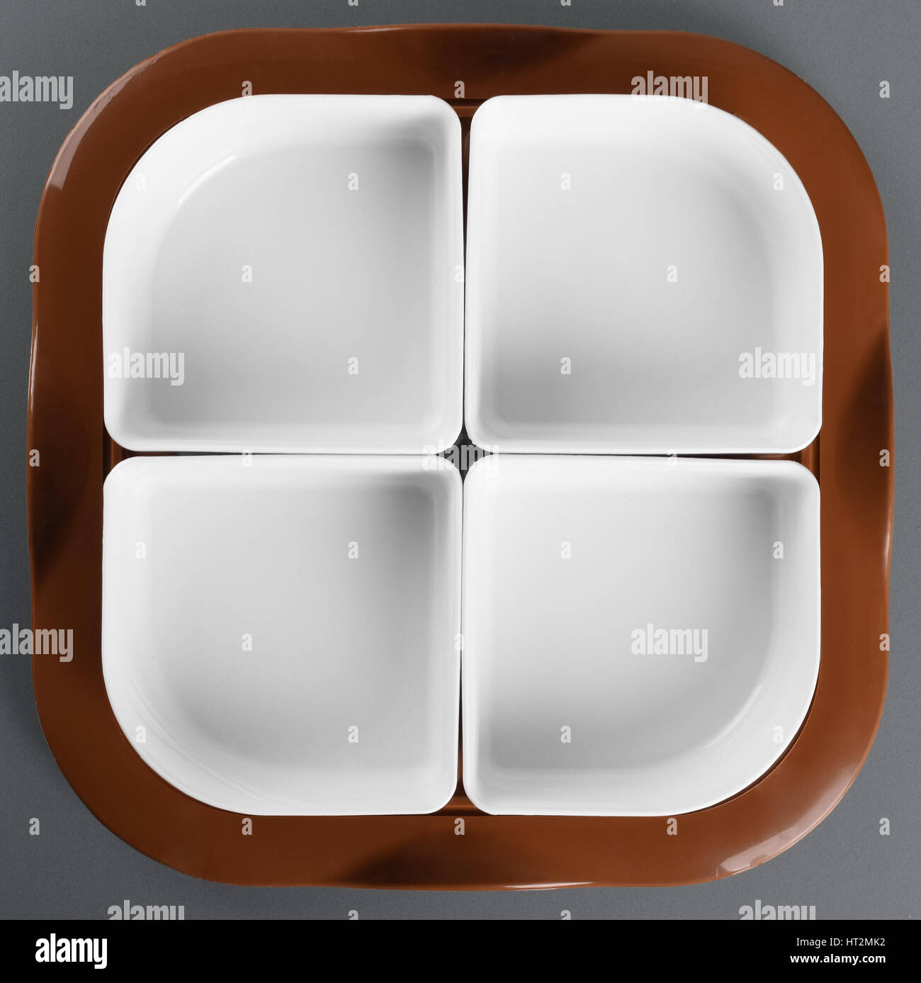 Shallow plastic bowl with four compartments Stock Photo - Alamy