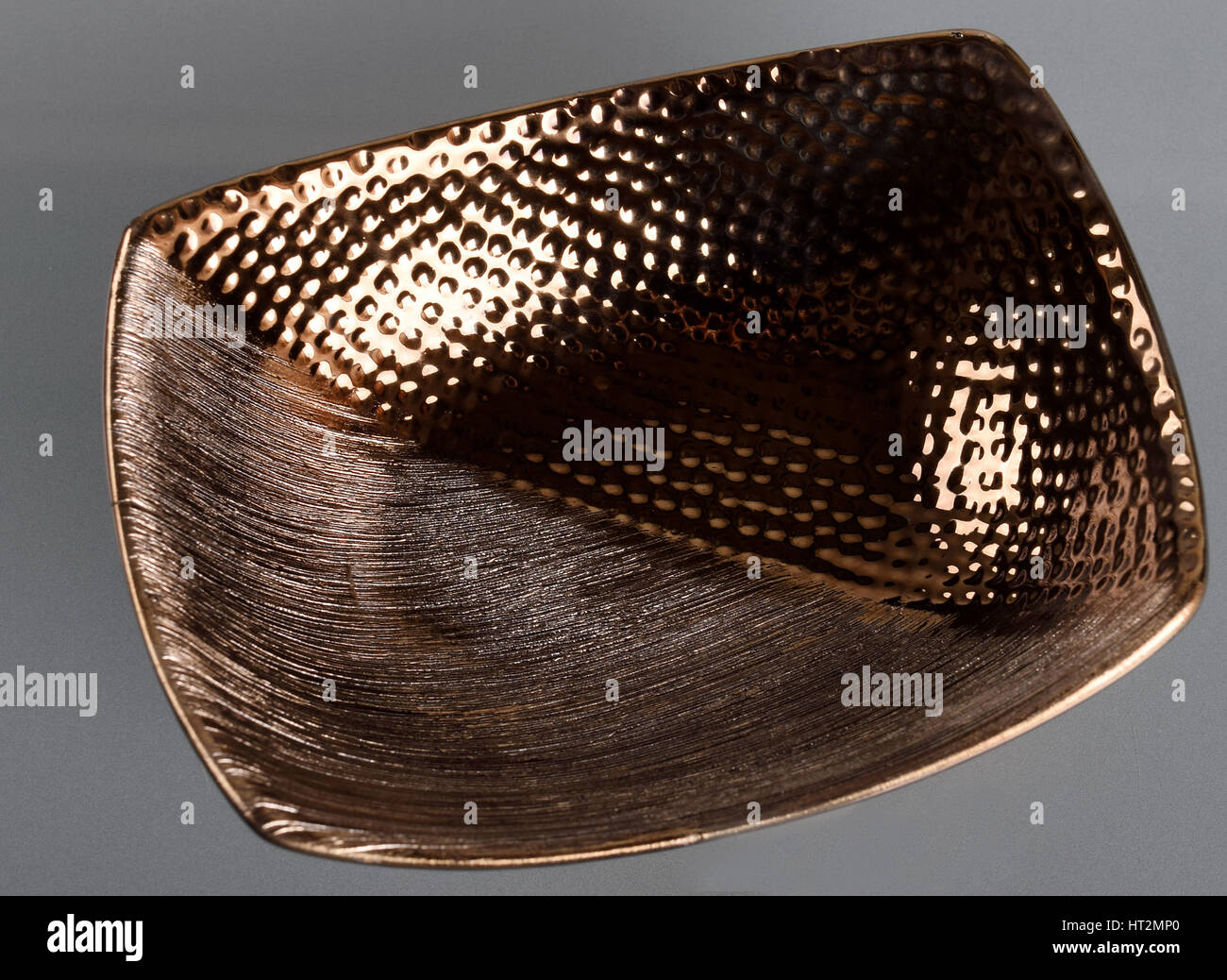 Golden deep ceramic bowl, top view Stock Photo - Alamy