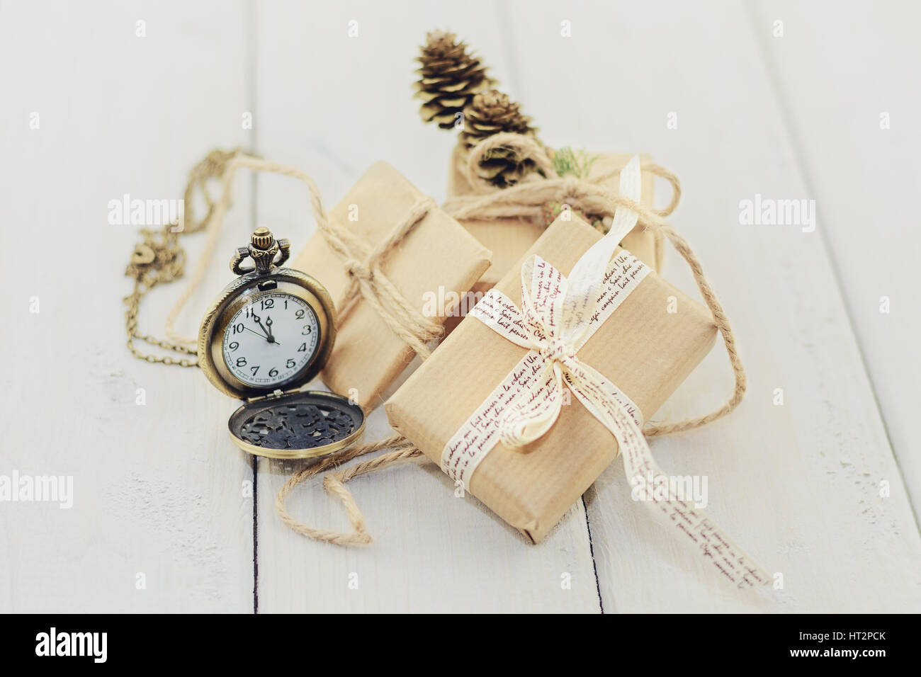 Three boxes on light background tied with a rope, ribbon decorate the ...