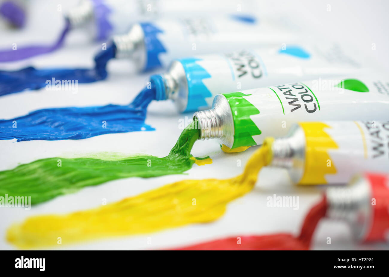 Colorful water colour in tubes on a white background Stock Photo - Alamy