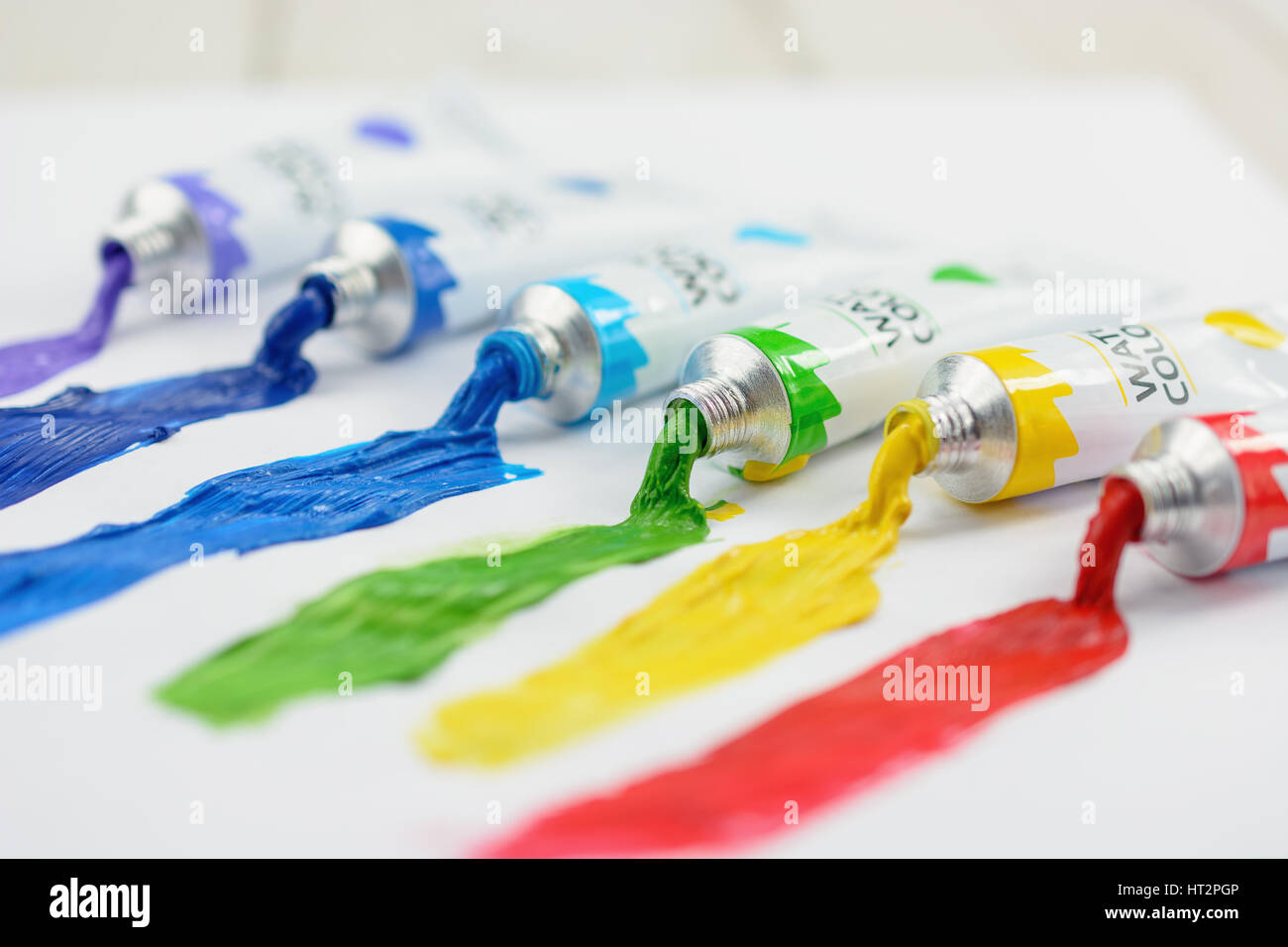 Colorful water colour in tubes on a white background Stock Photo - Alamy