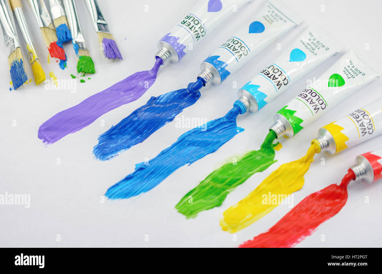 Colorful water colour in tubes on a white background Stock Photo - Alamy