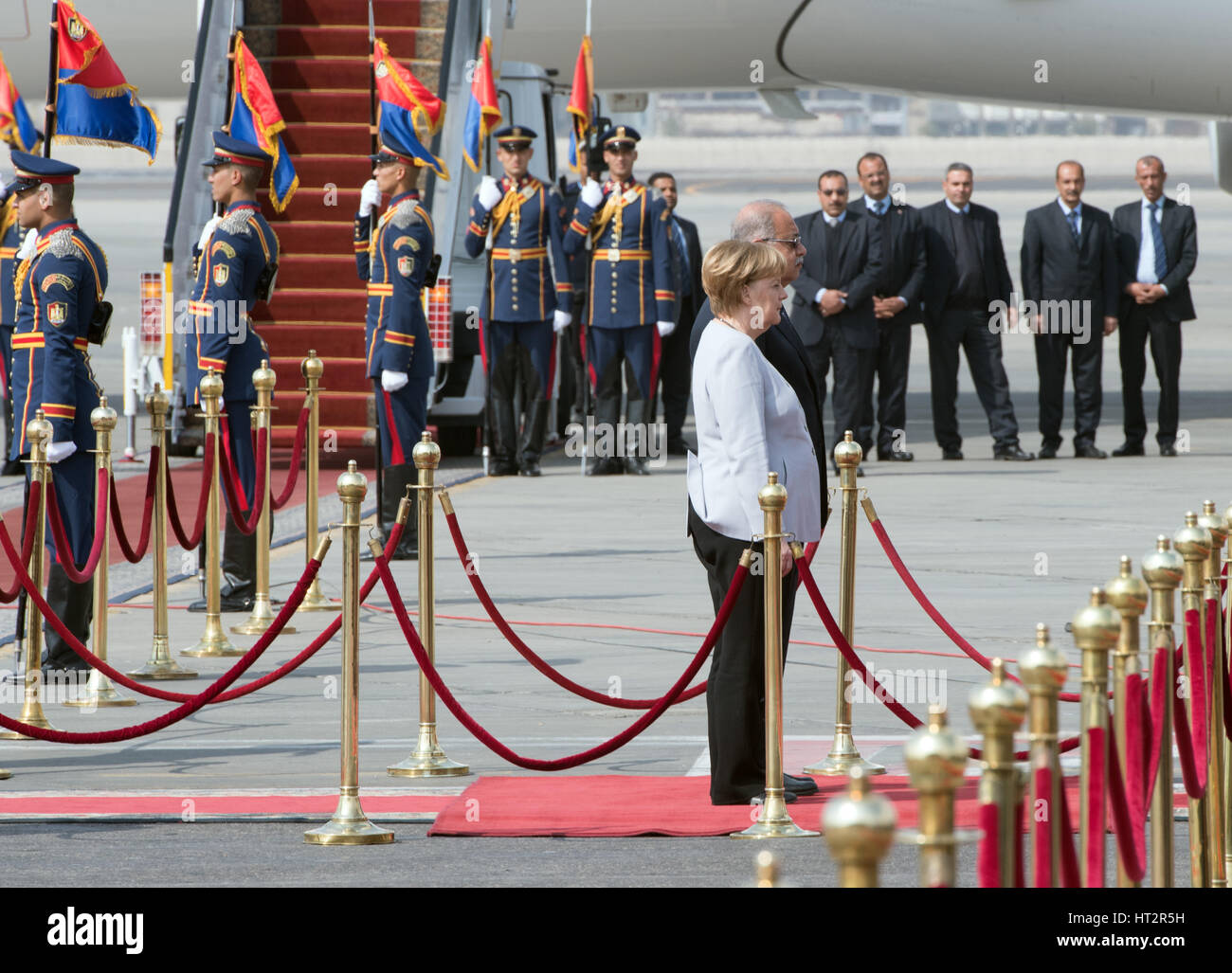 German Chancellor Angela Merkel is welcomed with military honours by ...