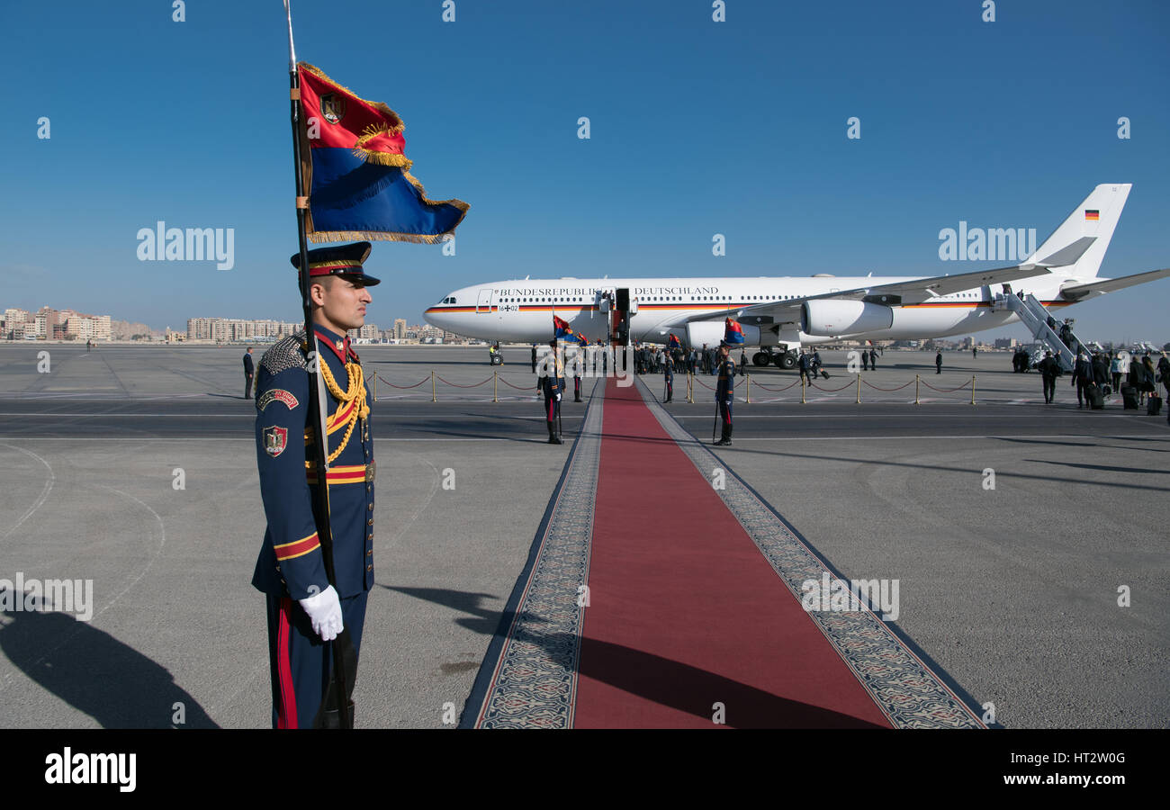 Cairo, Egypt. 03rd Mar, 2017. A soldier with a German flag awaits the ...