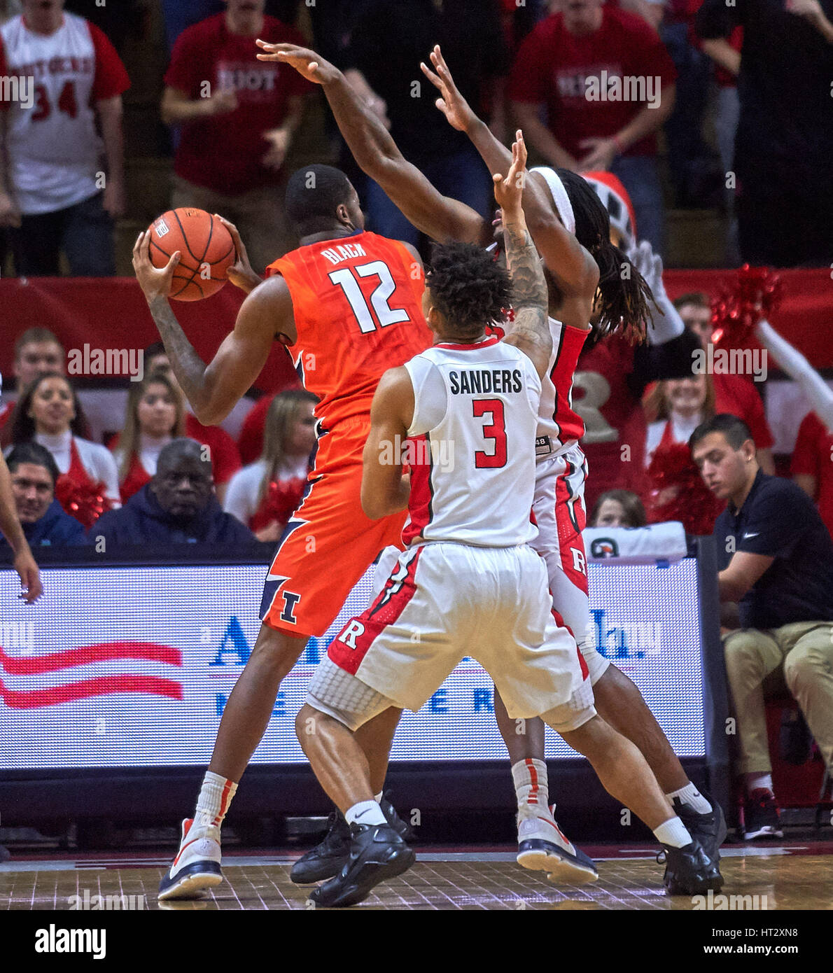Illinois's forward Leron Black (12) gets pressure from Rutgers' guard ...