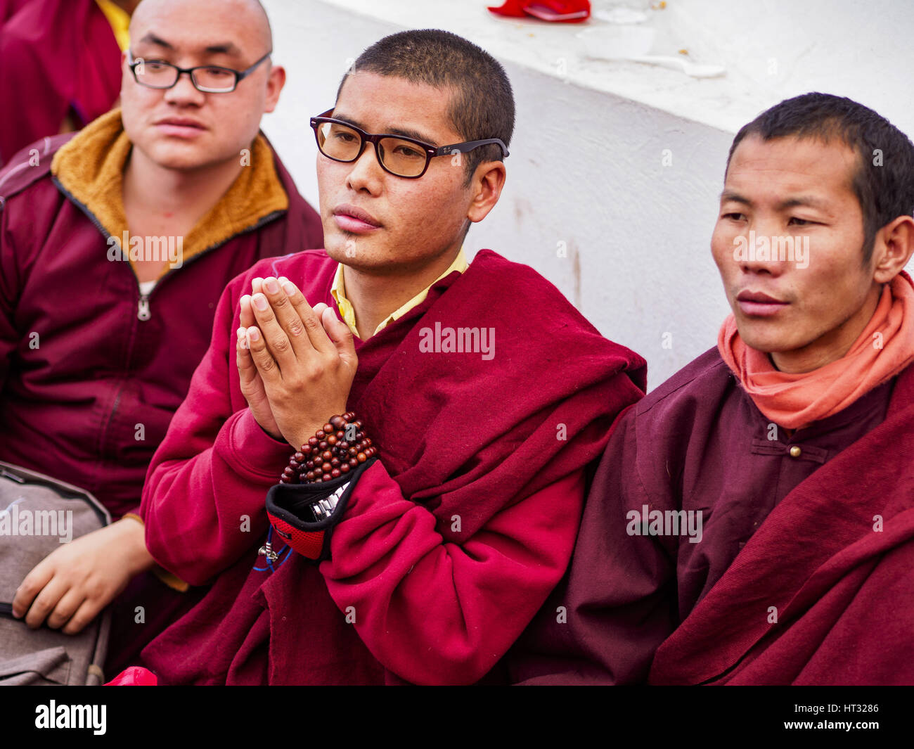 Kathmandu, Nepal. 7th Mar, 2017. A monk prays during the consecration ...