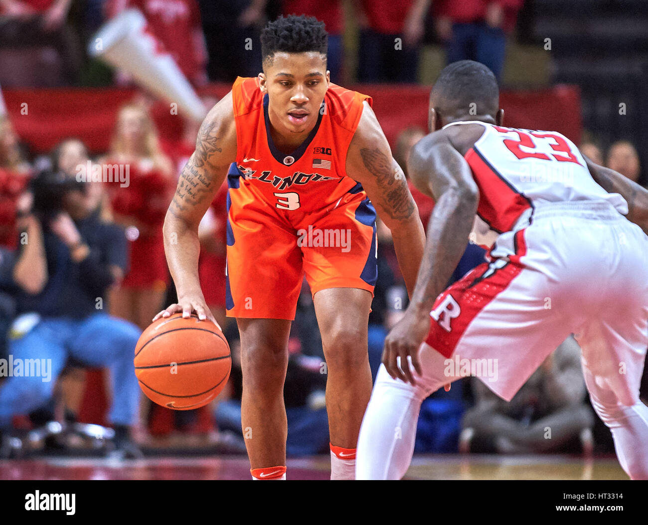 Illinois's guard Te'Jon Lucas (3) brings the down court as Rutgers ...