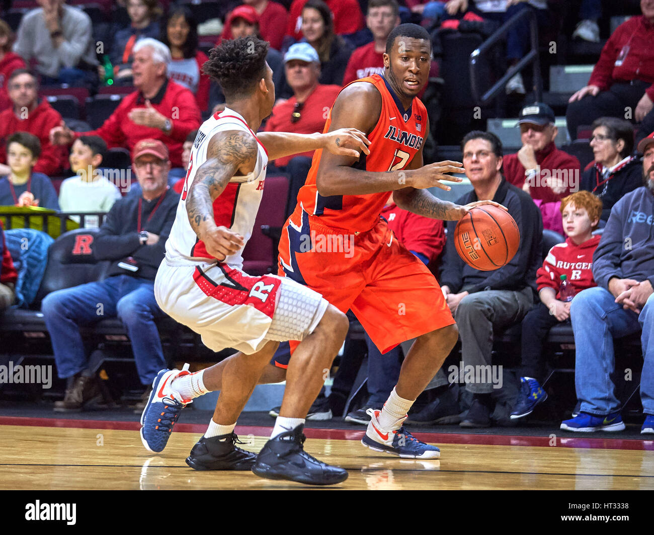 Illinois's forward Leron Black (12) gets pressure from Rutgers' guard ...