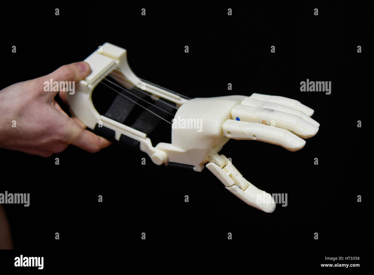 London, UK. 7th Mar, 2017. An exhibitor shows a low cost prosthetic ...