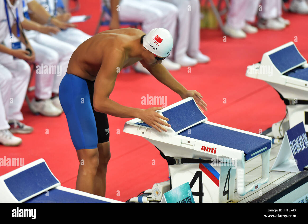 China. 7th Mar, 2017. Chinese swimmer Ning Zetao does warm-up exercises ...