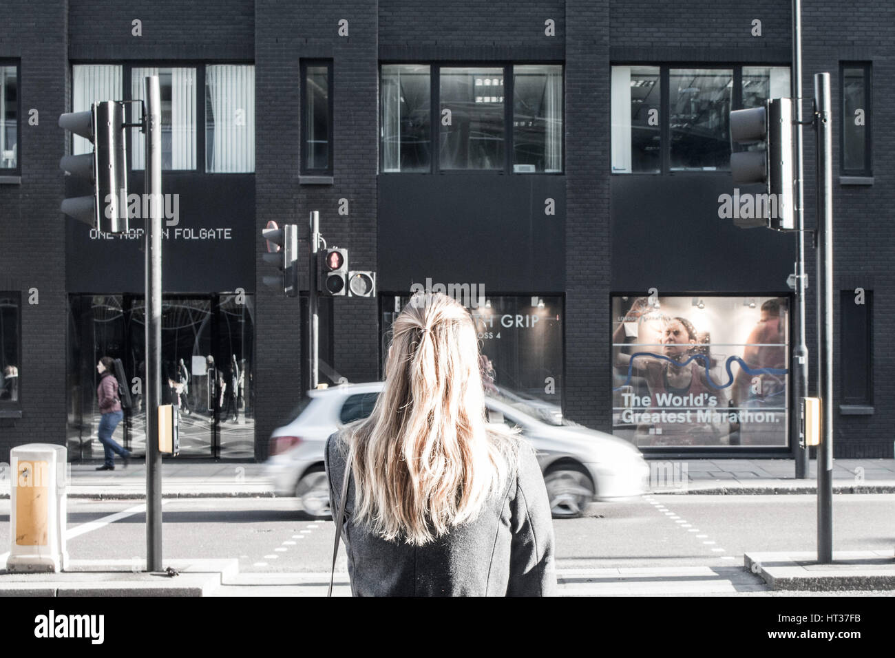 Woman waiting for the signal Stock Photo - Alamy