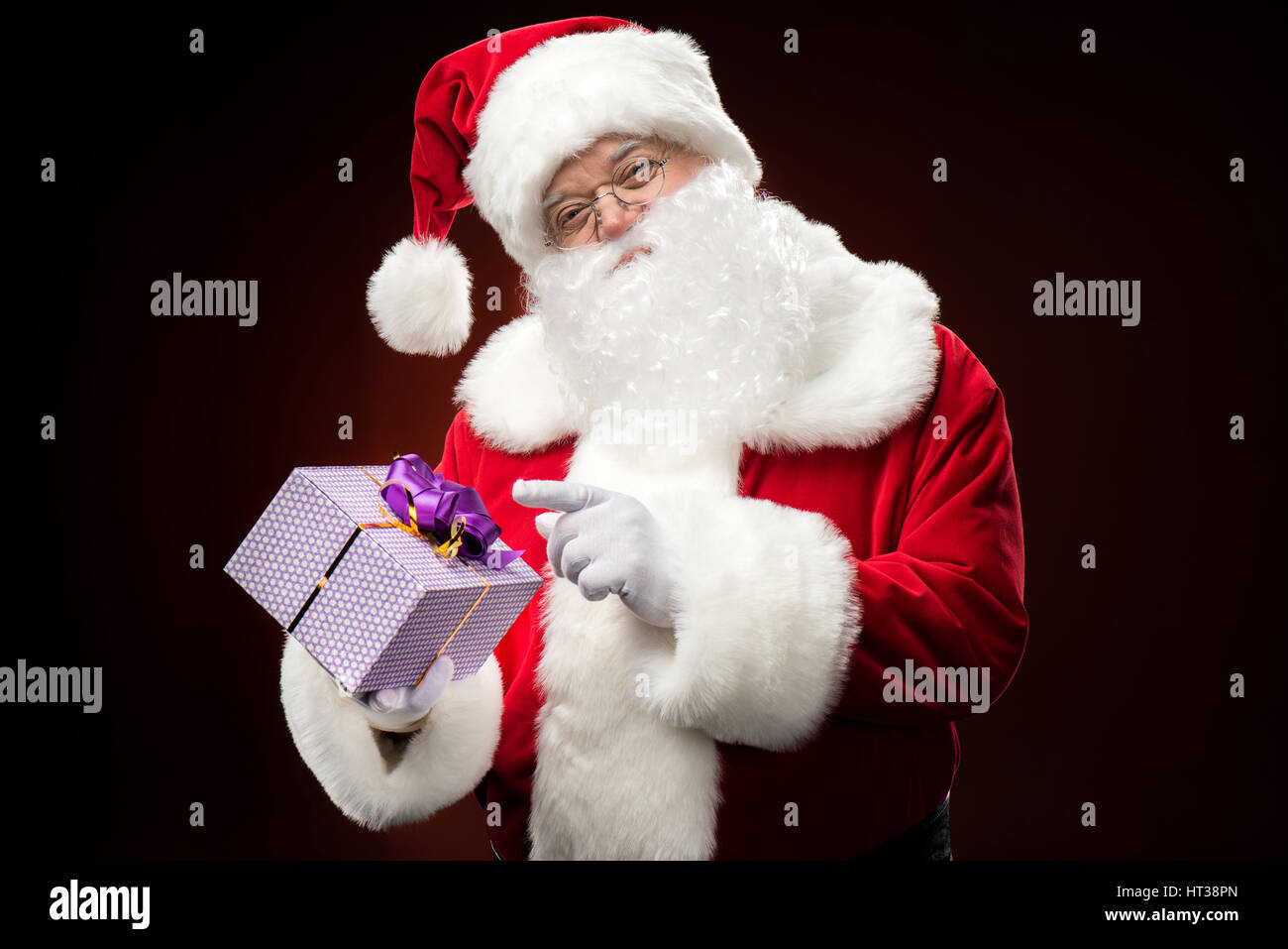 Pointing at gift hi-res stock photography and images - Alamy