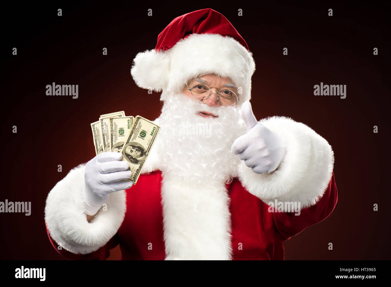 Happy santa claus showing cash hi-res stock photography and images - Alamy