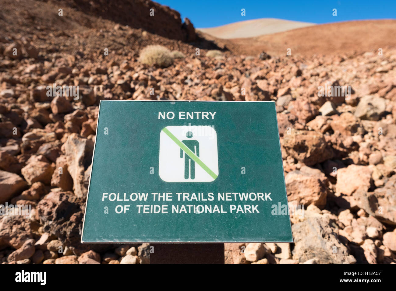 Sign trespassing prohibited in front of boulders, Teide national park ...