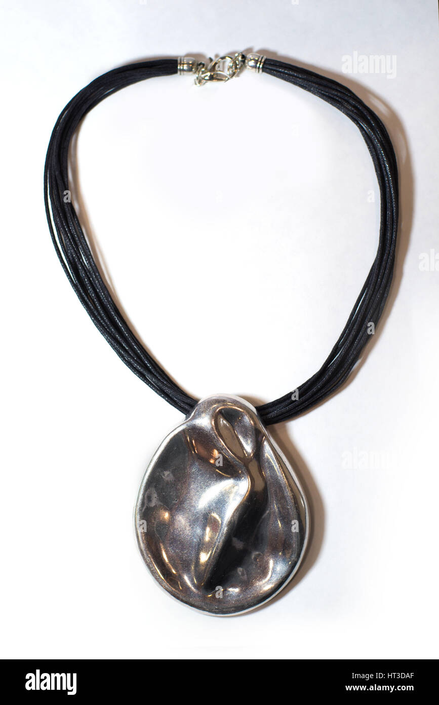 Necklace metal plastic on a white background ethnic Stock Photo - Alamy