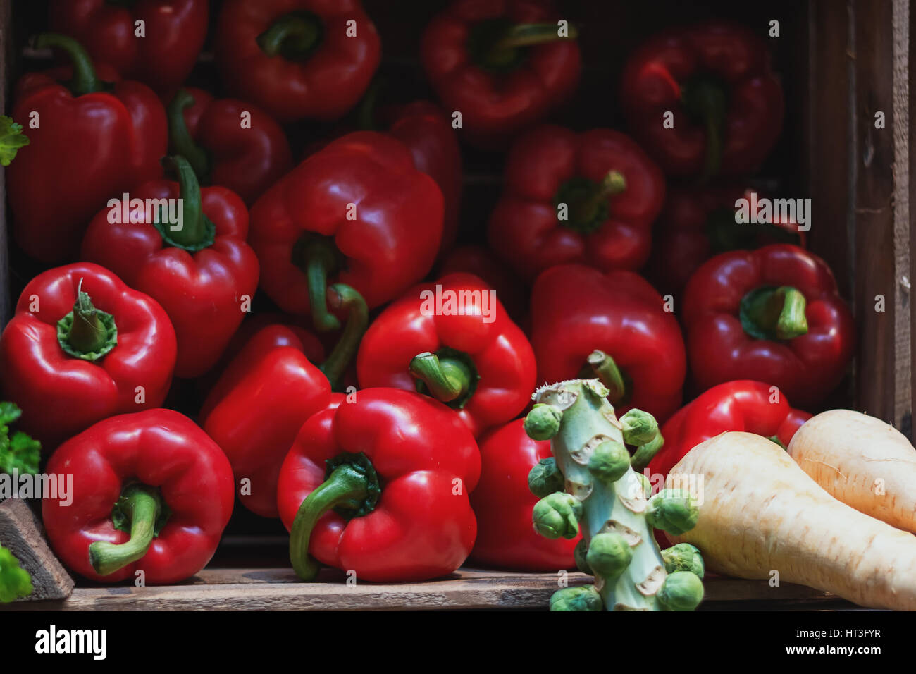 Red peppers in crates displayed on the food festival Stock Photo - Alamy