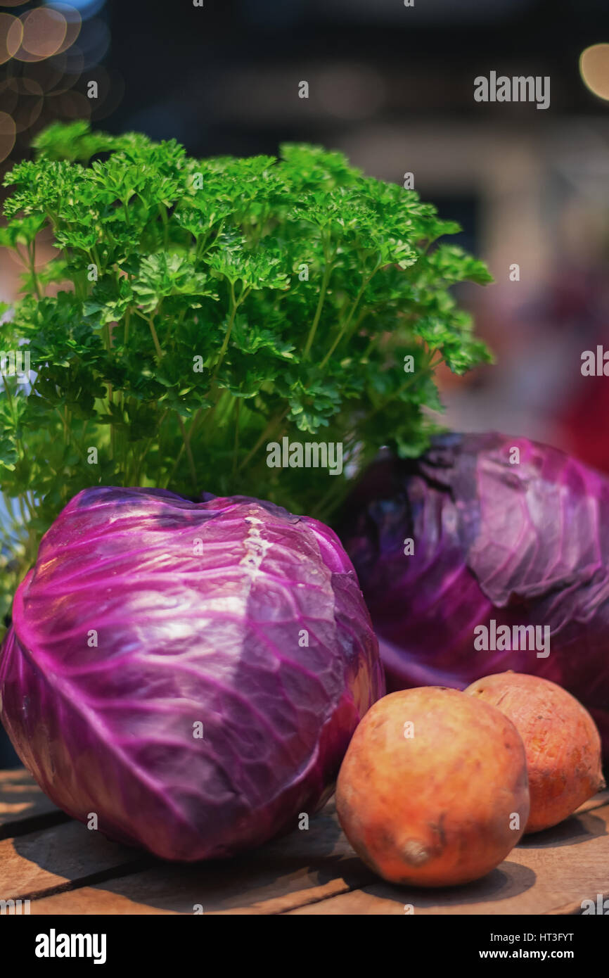 Sweet potato, red cabbage and parsley displayed on the food festival ...