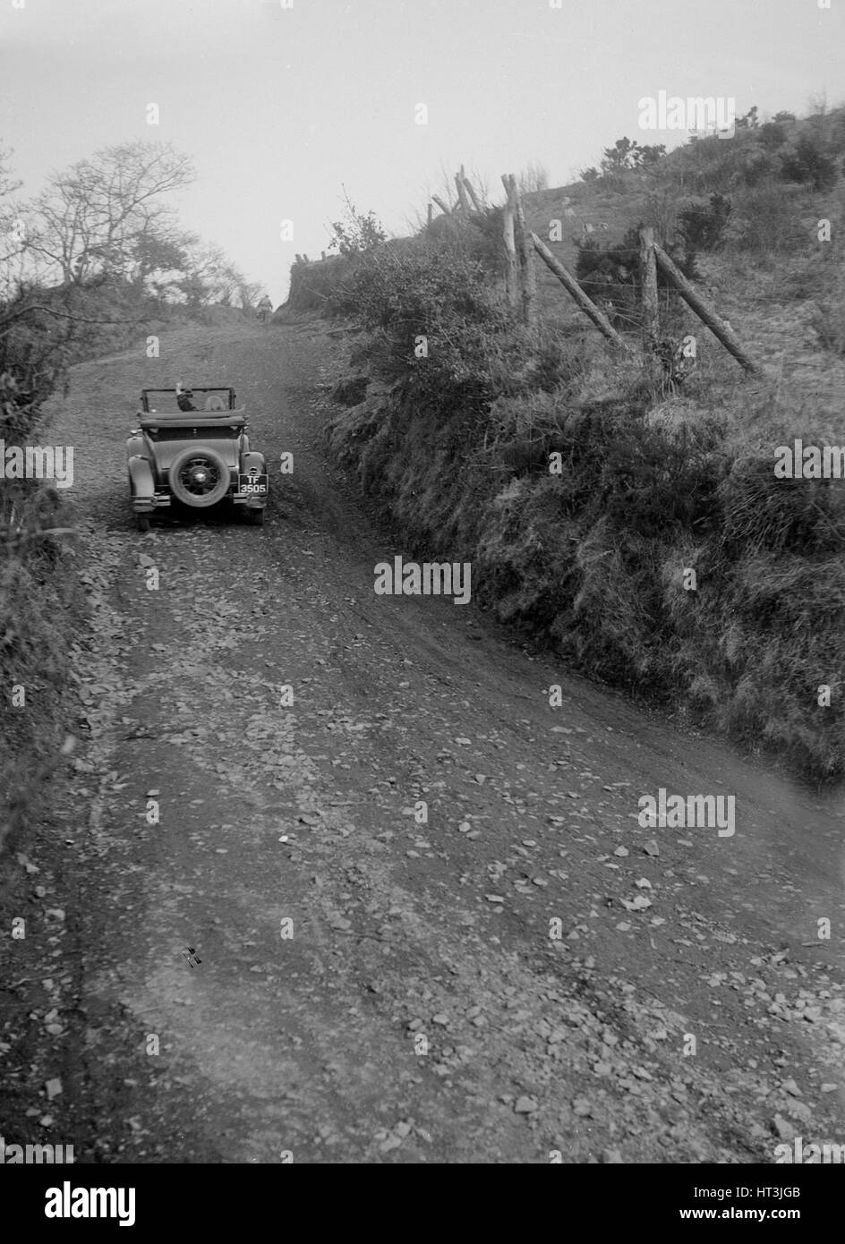 Kitty Brunell driving a 1930 2-seater Ford Model A, 1931. Artist: Bill ...