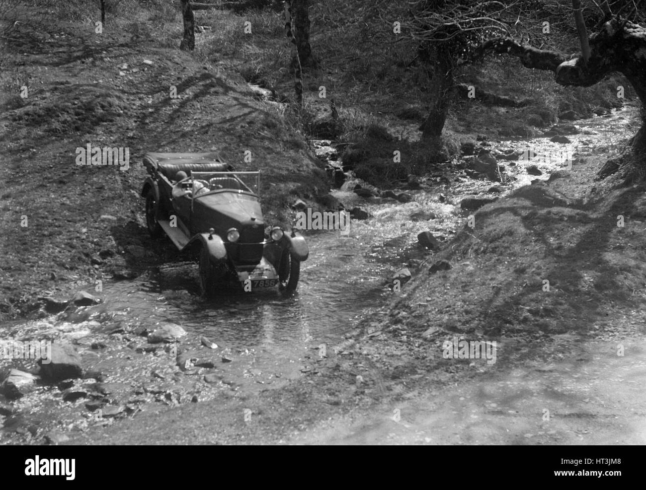 Kitty Brunell road testing a Riley 9 WD tourer, c1930. Artist: Bill ...
