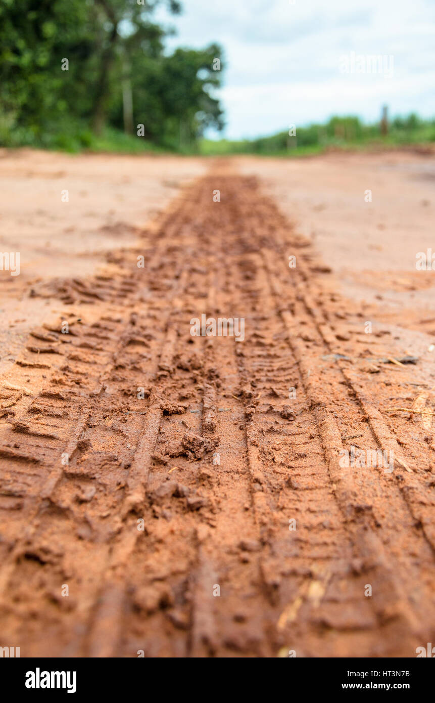 Tire track on the ground. Tire track texture on a farm road Stock Photo ...