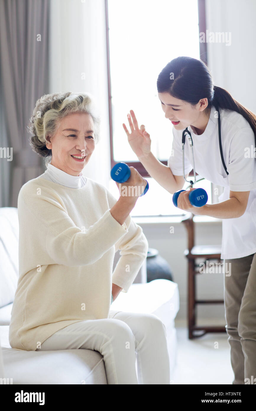 Seniors talking sofa in nursing hi-res stock photography and images - Alamy