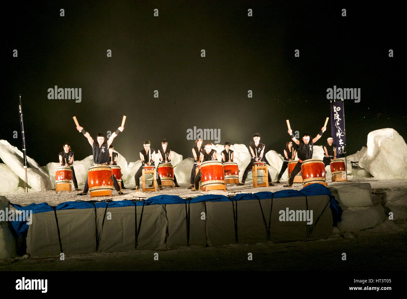 Traditional Japanese drummers (taiko) perform at an outdoor winter ...