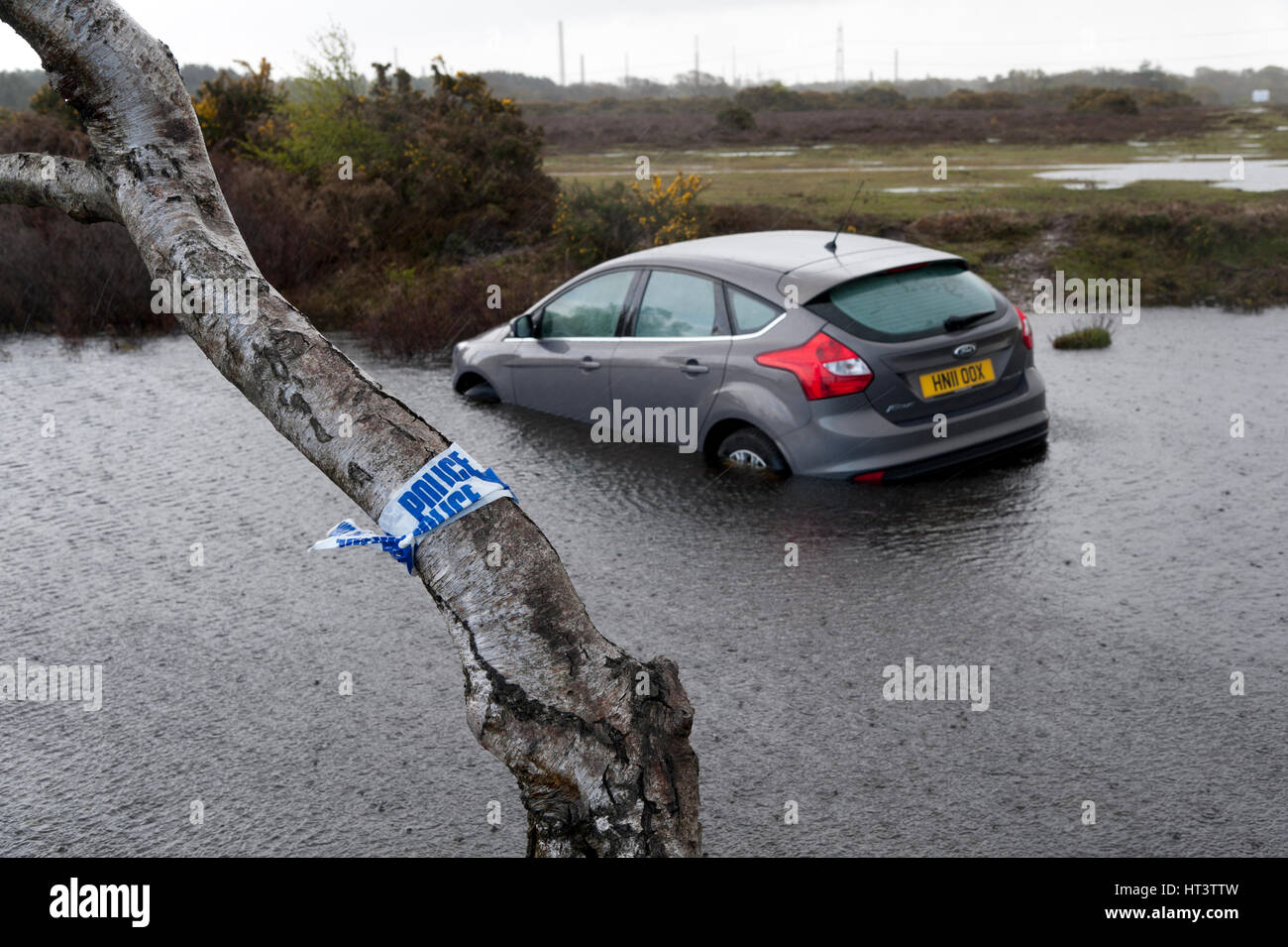 Ford Focus in flooded ditch after losing control on wet road 2012 ...