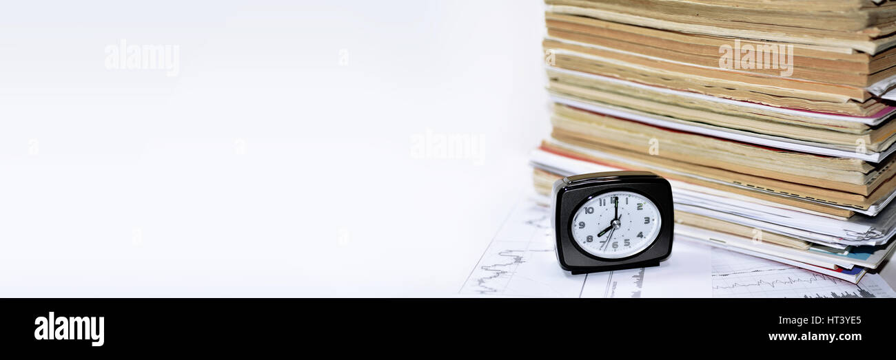 Old books with clock. Isolated documents on white background Stock ...