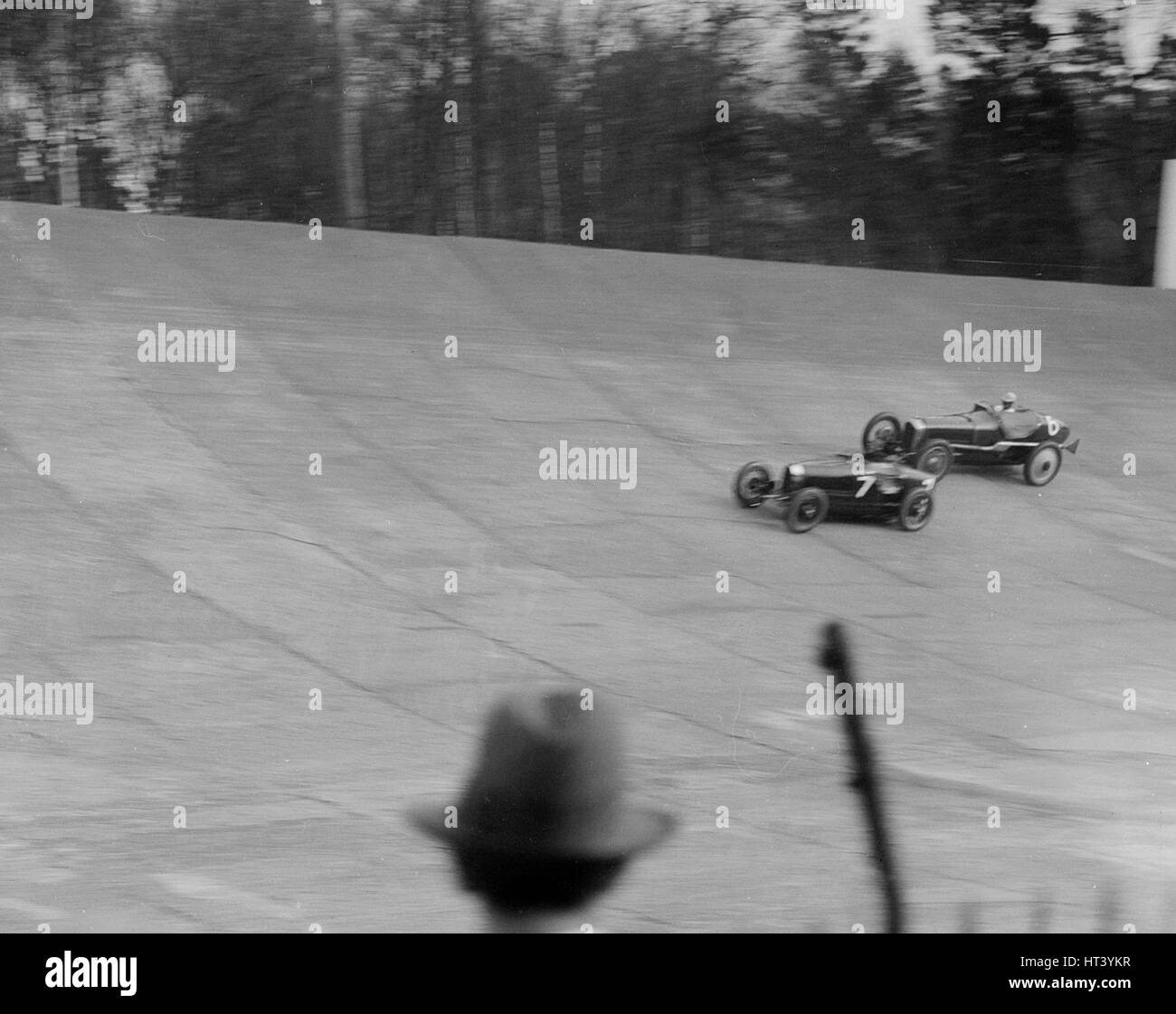 Bugatti Type 35 of EM Thomas and Ballot of Jack Dunfee racing at a BARC ...