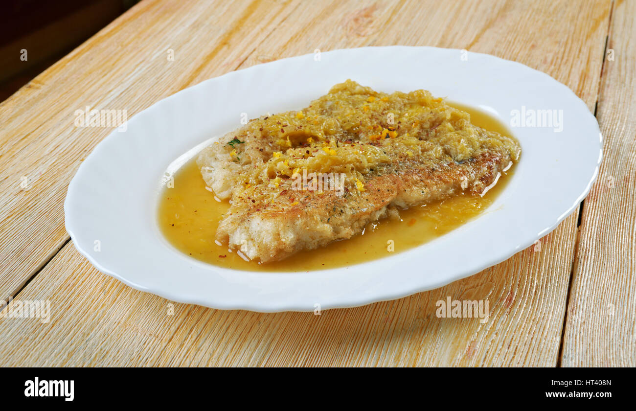 Grilled Monkfish in Orange Sauce Stock Photo - Alamy