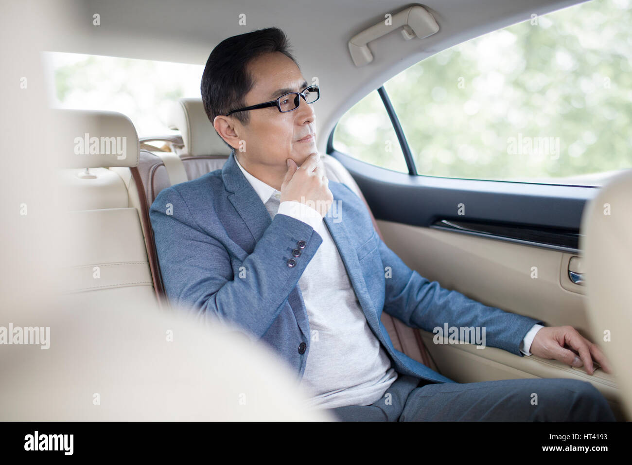 Man sitting in sedan hi-res stock photography and images - Alamy